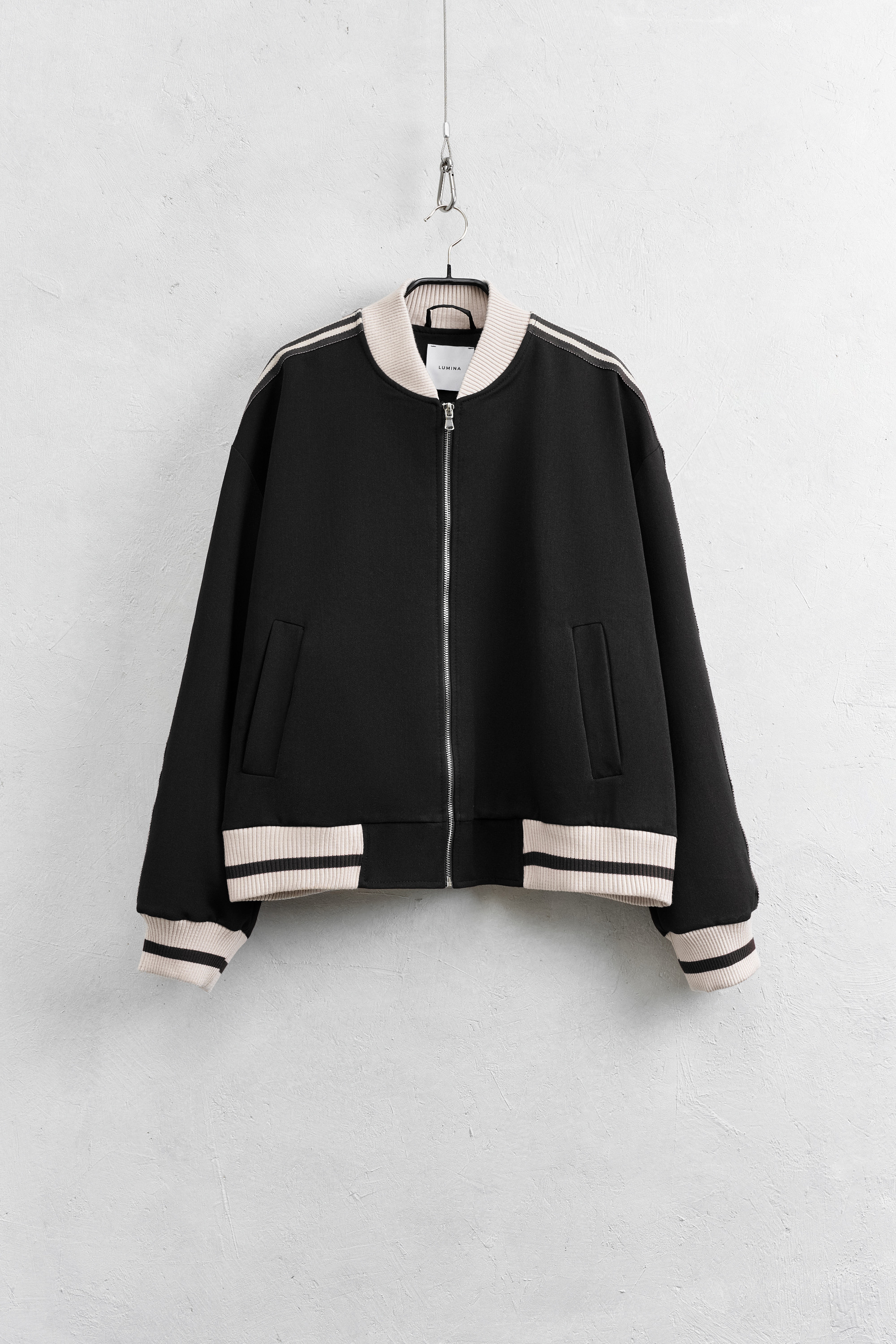 JACKET WITH BANDS ON THE SLEEVES